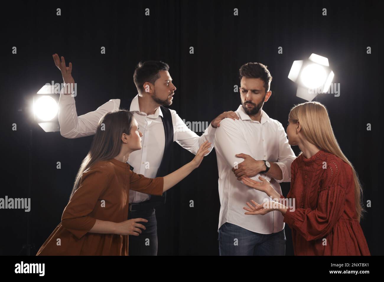Professional actors rehearsing on stage in theatre Stock Photo - Alamy