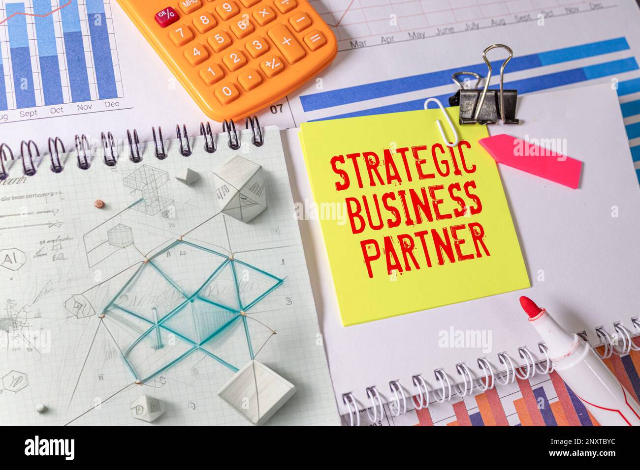 Text Strategic Business Partner on clipboard, pen, calculator, charts. Business concept. Flat ...