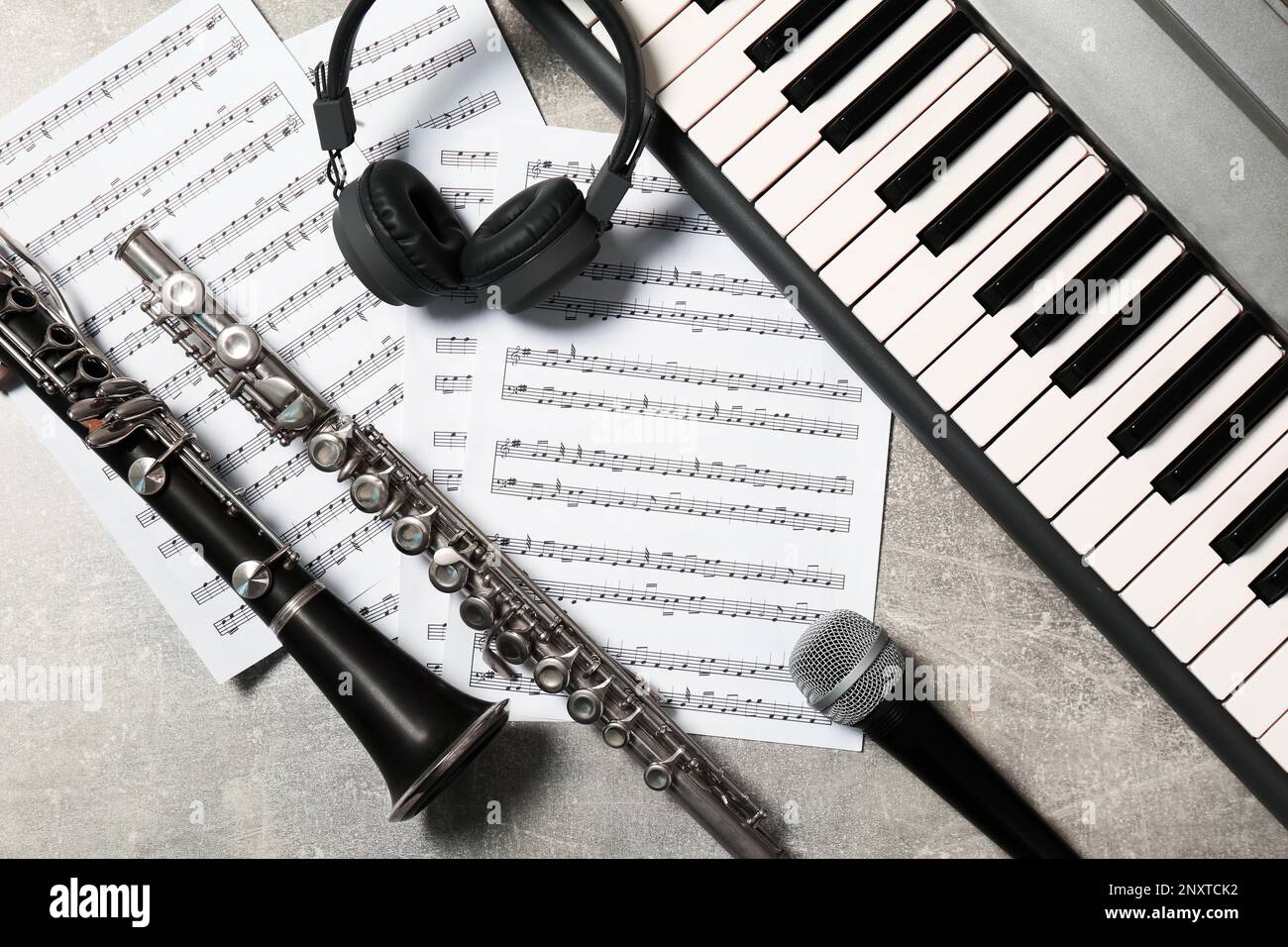 Flat lay composition with different musical instruments and microphone ...