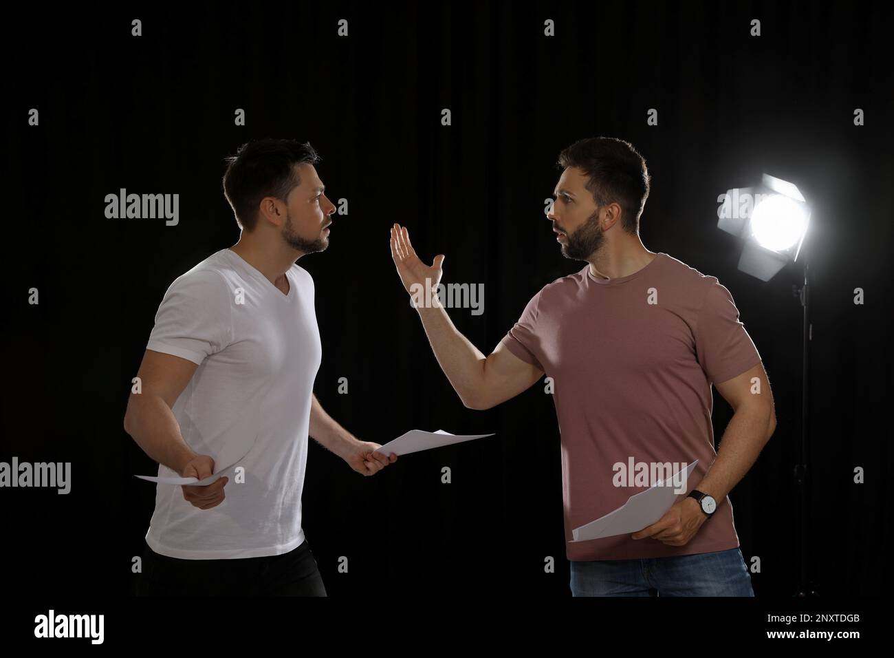 Professional actors rehearsing on stage in theatre Stock Photo - Alamy