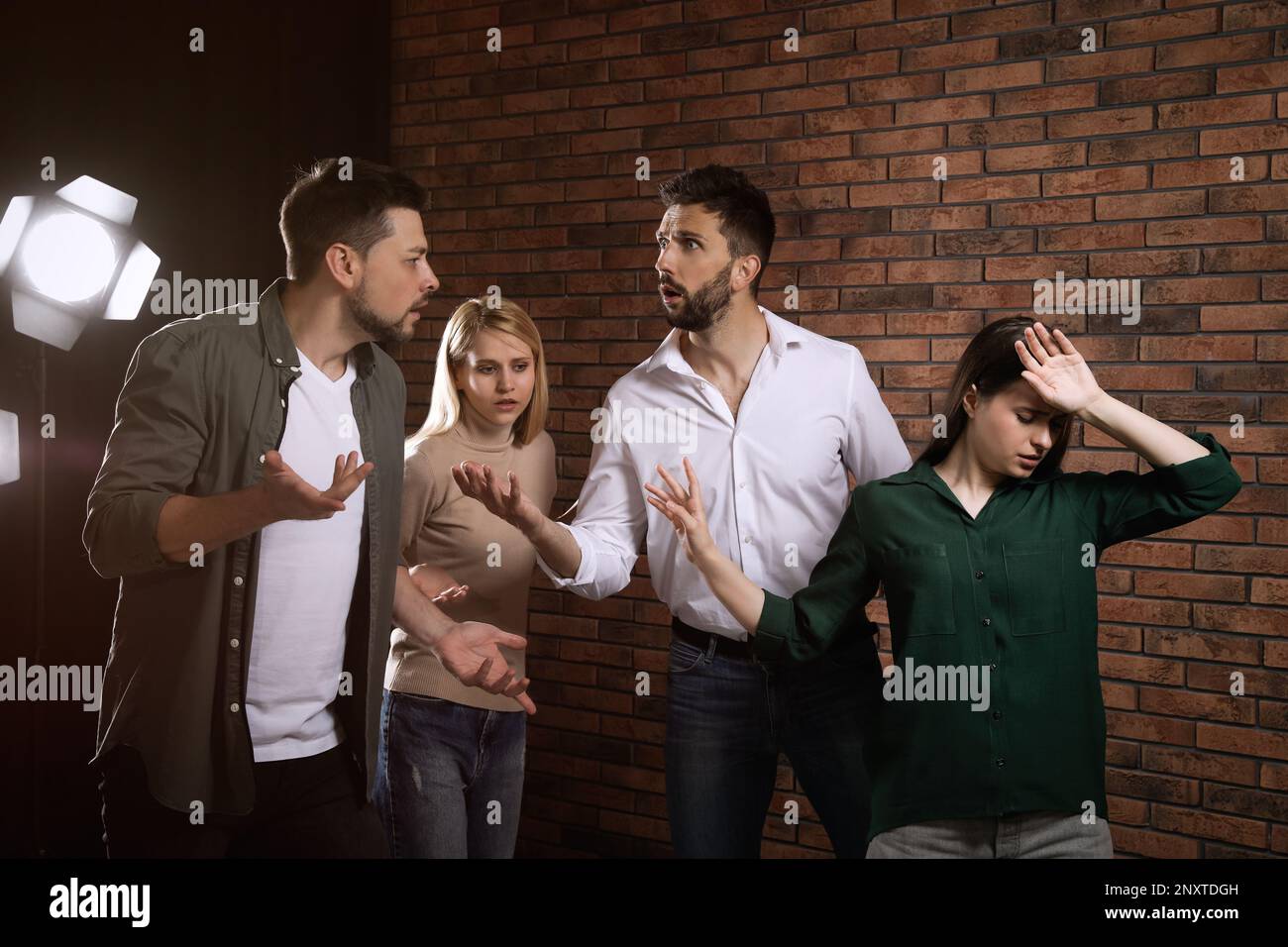 Professional actors rehearsing on stage in theatre Stock Photo - Alamy