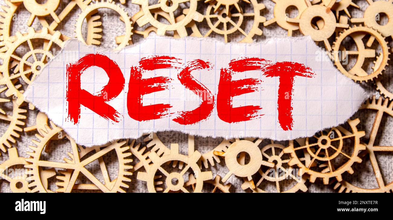 White tile alphabet letter with word reset on wood background Stock ...