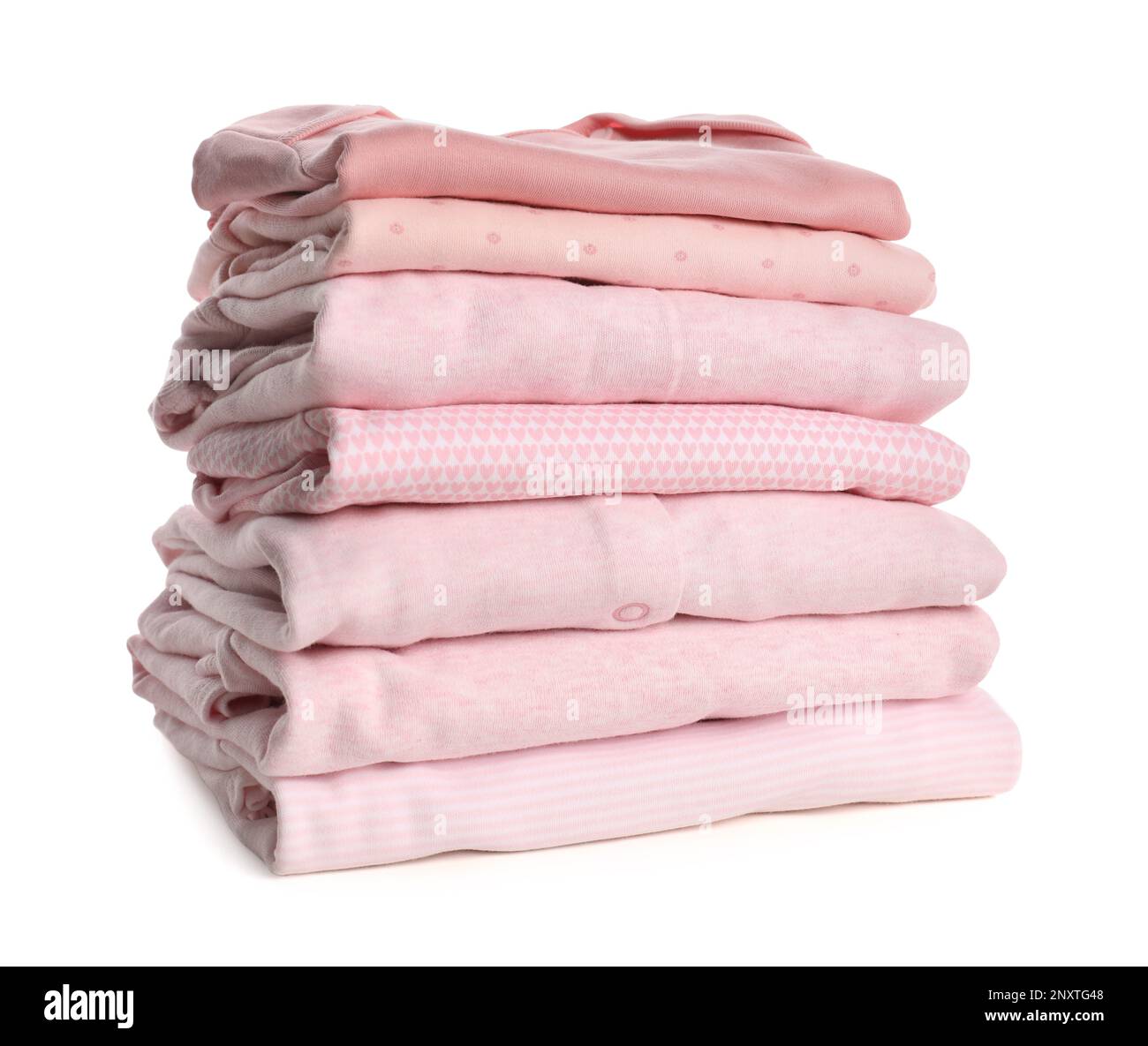 Stack of baby girl's clothes on white background Stock Photo - Alamy