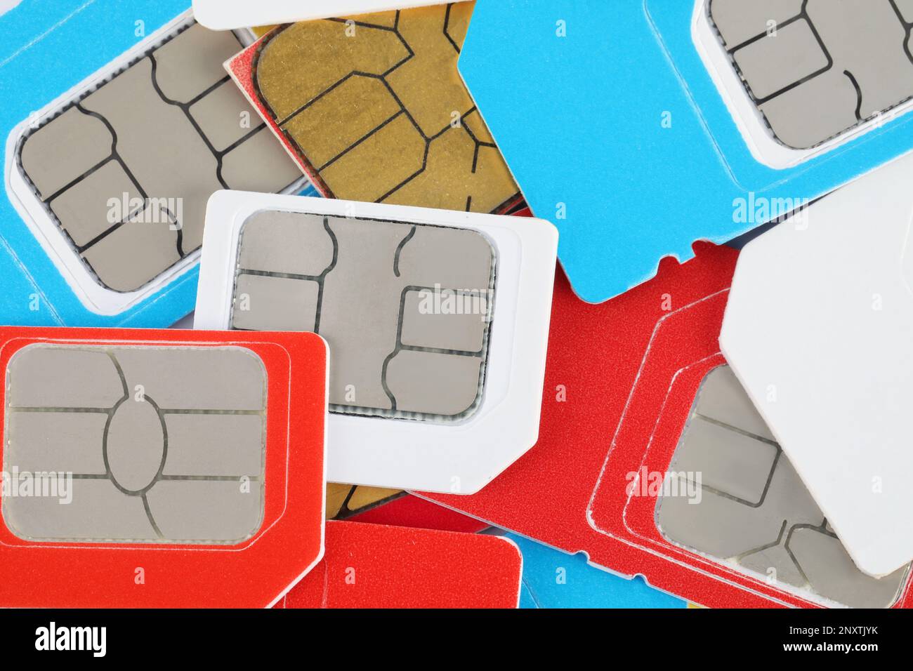 Different SIM cards as background, top view Stock Photo - Alamy