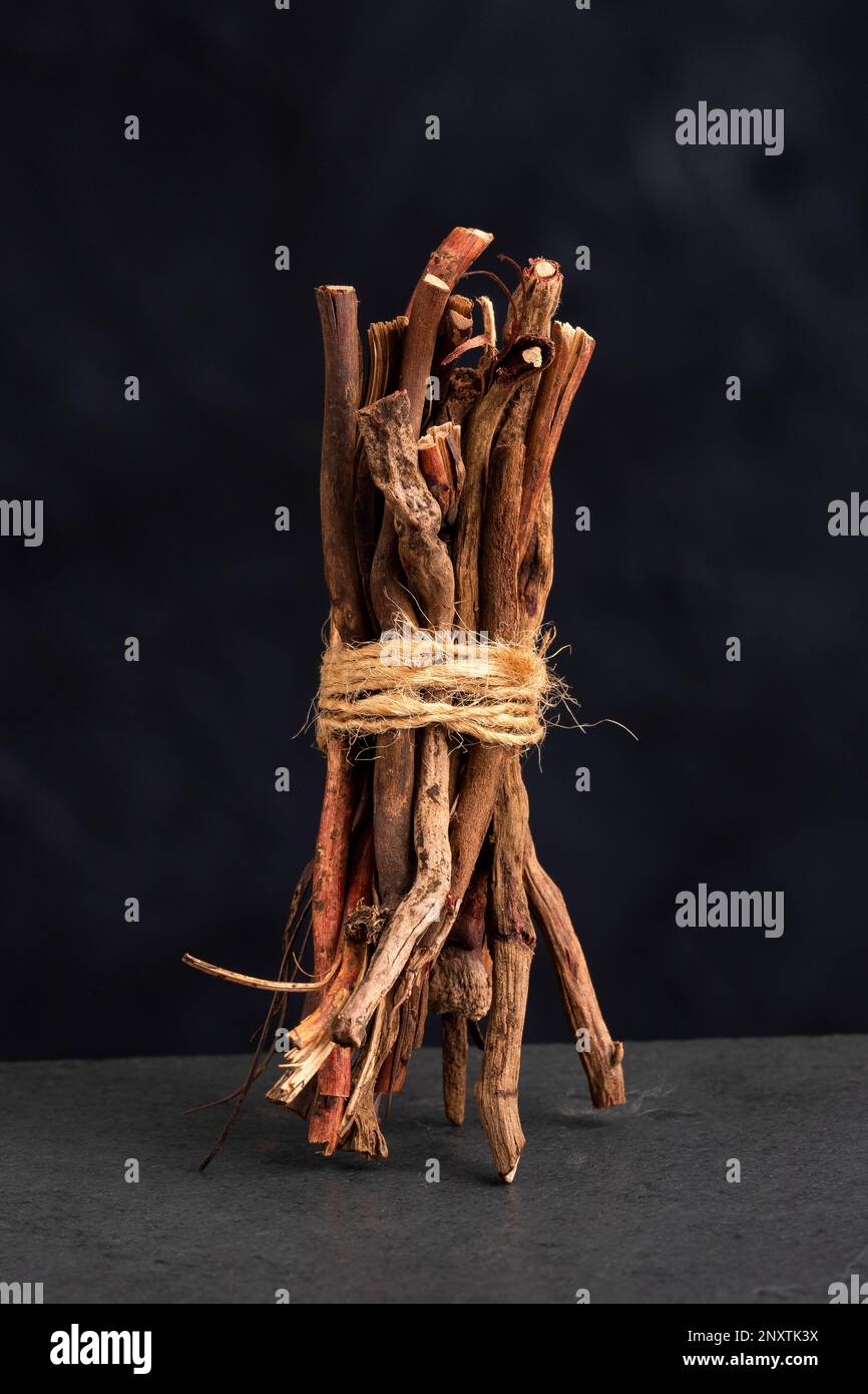 Dried organic sarsaparilla sticks - Smilax aspera Stock Photo - Alamy