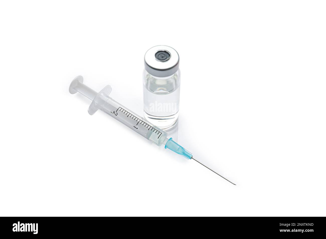 Disposable syringe with needle and vial on white background Stock Photo ...
