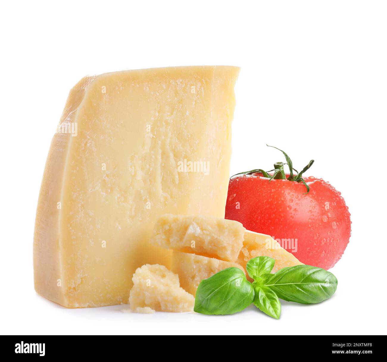 Delicious parmesan cheese, tomato and basil on white background Stock ...