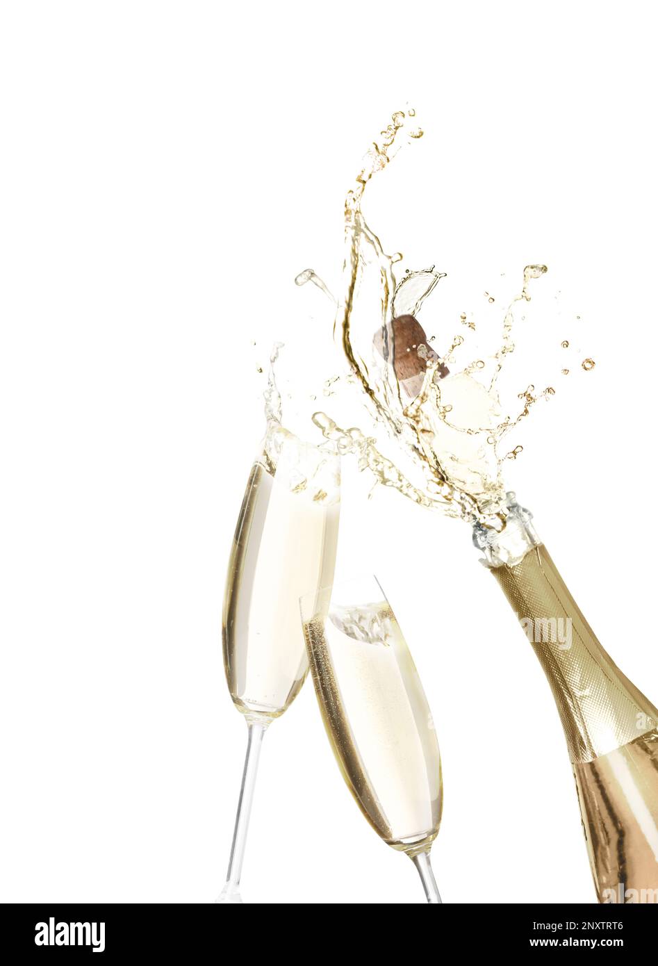 Sparkling wine splashing out of bottle and glasses on white background ...