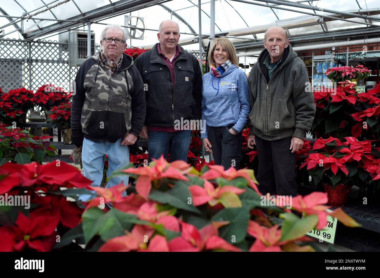 In this Thursday, Dec. 7, 2017 photo, the Pinter family, from left, Doc ...