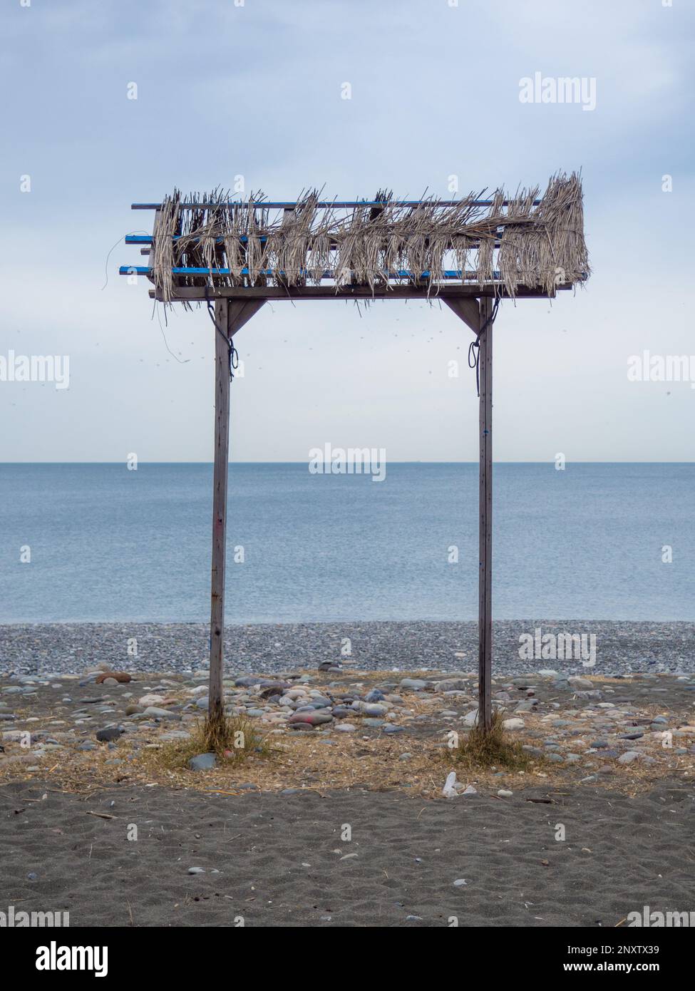 Destroyed scenery on the beach. Deserted beach in non-beach season ...