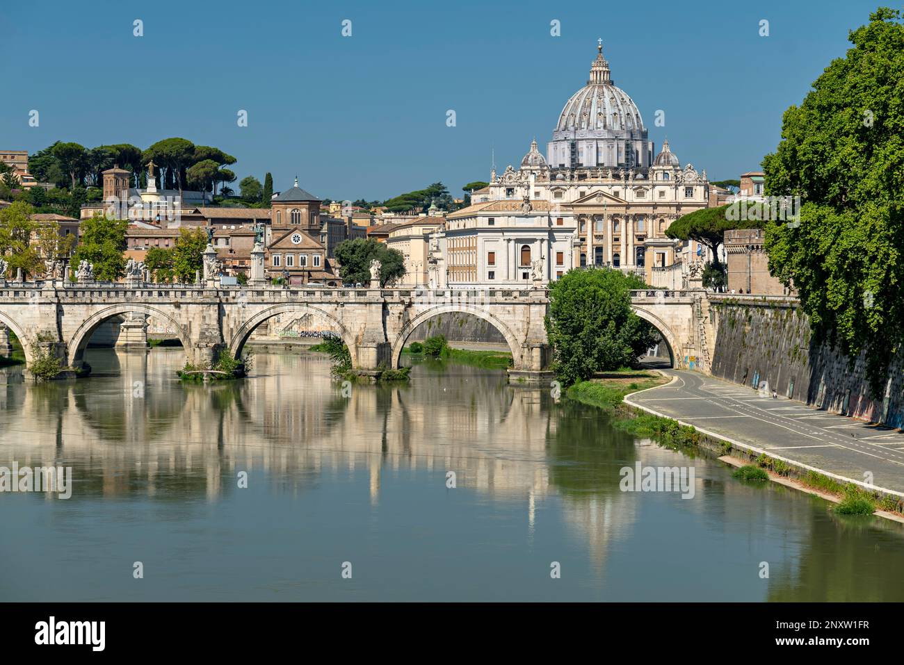 View of St. Peter's Basilica and bridges of Tiber river in Rome, Italy ...
