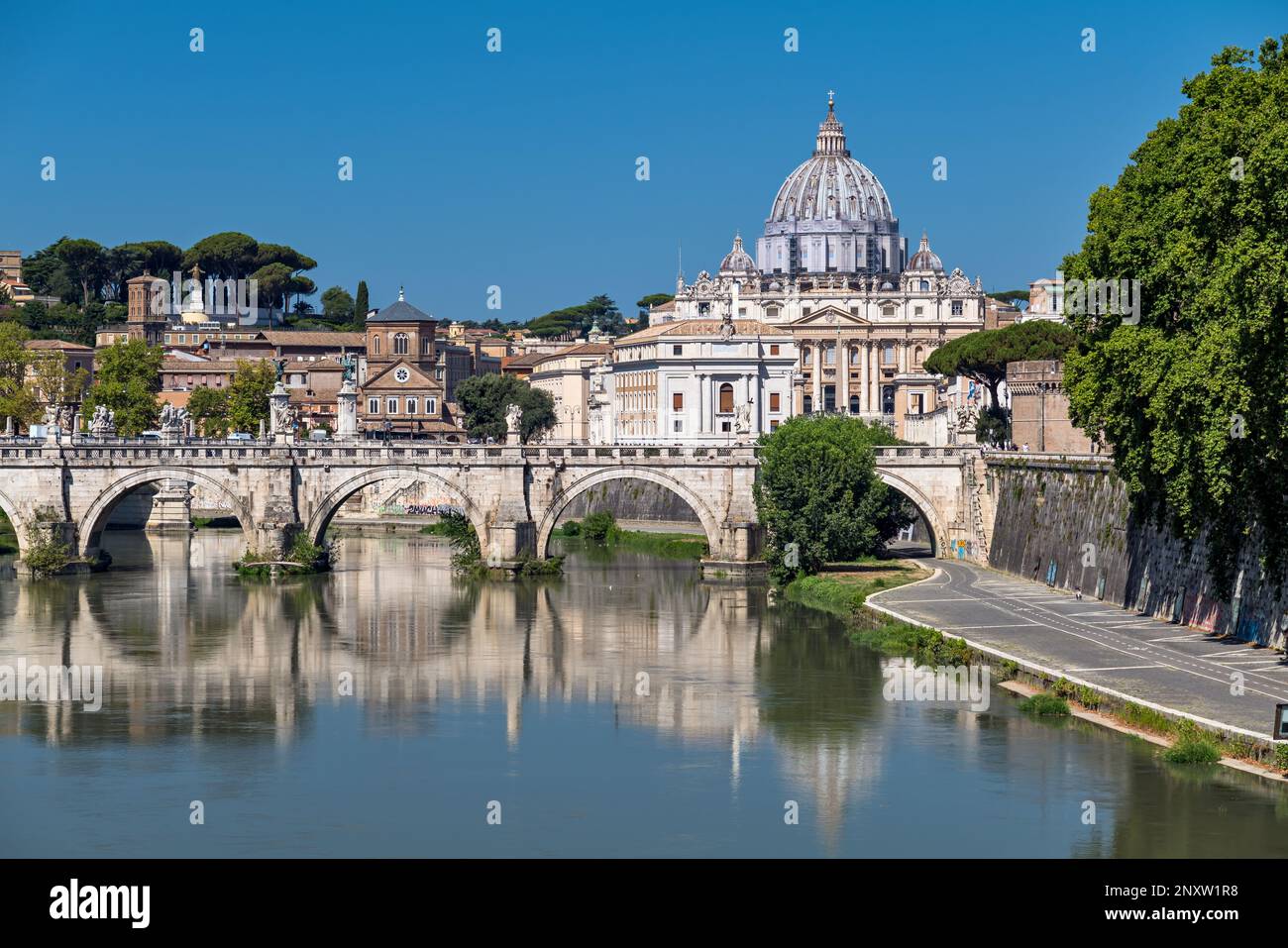 View of St. Peter's Basilica and bridges of Tiber river in Rome, Italy ...