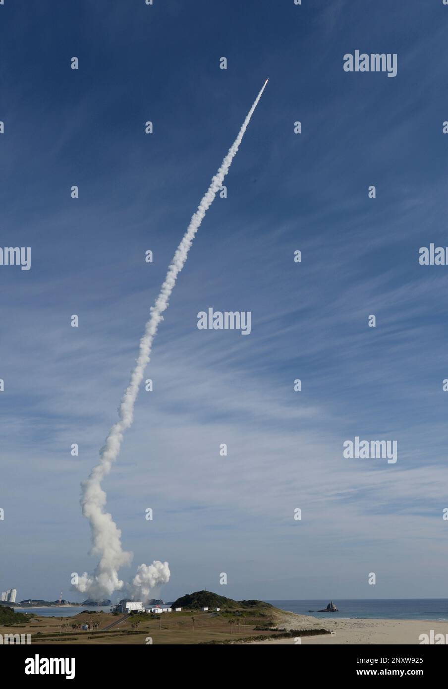 An H2A rocket No.37 carrying two satellites launches from Tanegashima ...