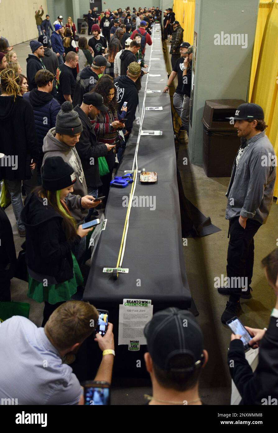 In this Dec. 16, 2017 photo, attendees at the Harvest Cup Cannabis ...
