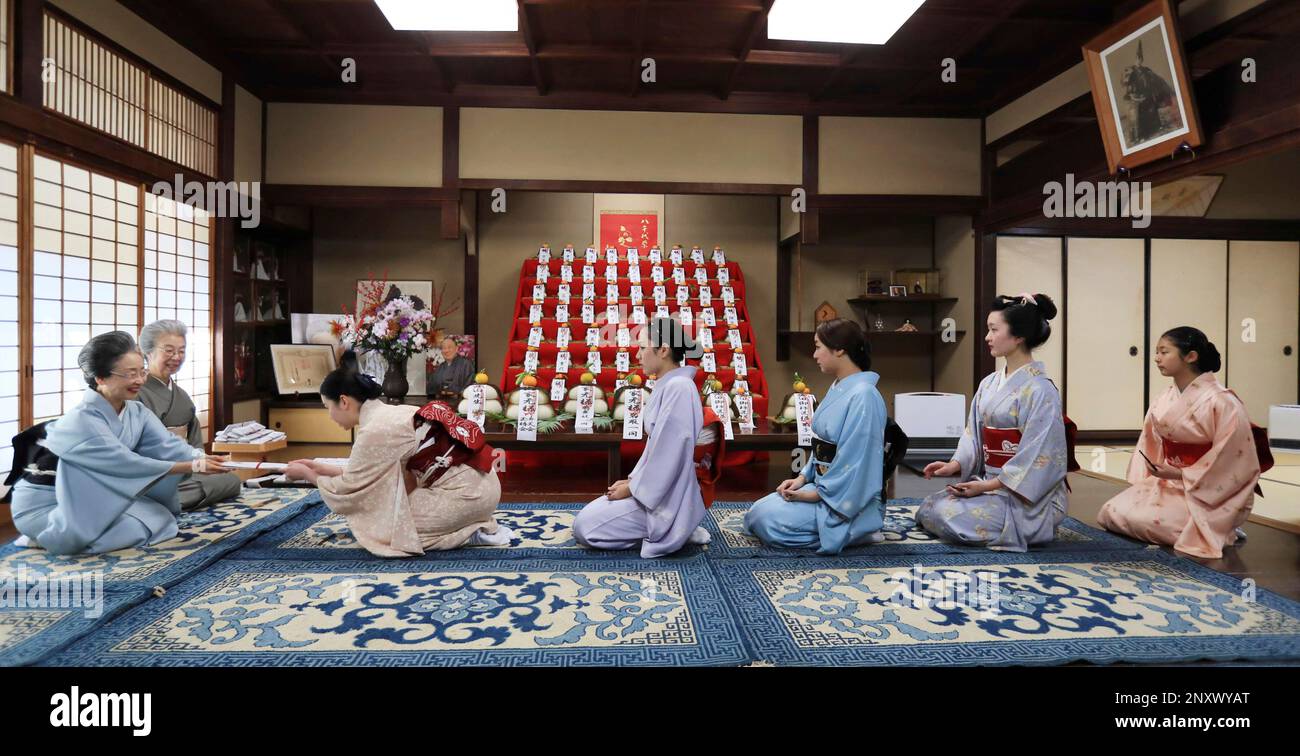 Maiko and Geiko call on their dance teacher Yachiyo Inoue(L) to offer ...