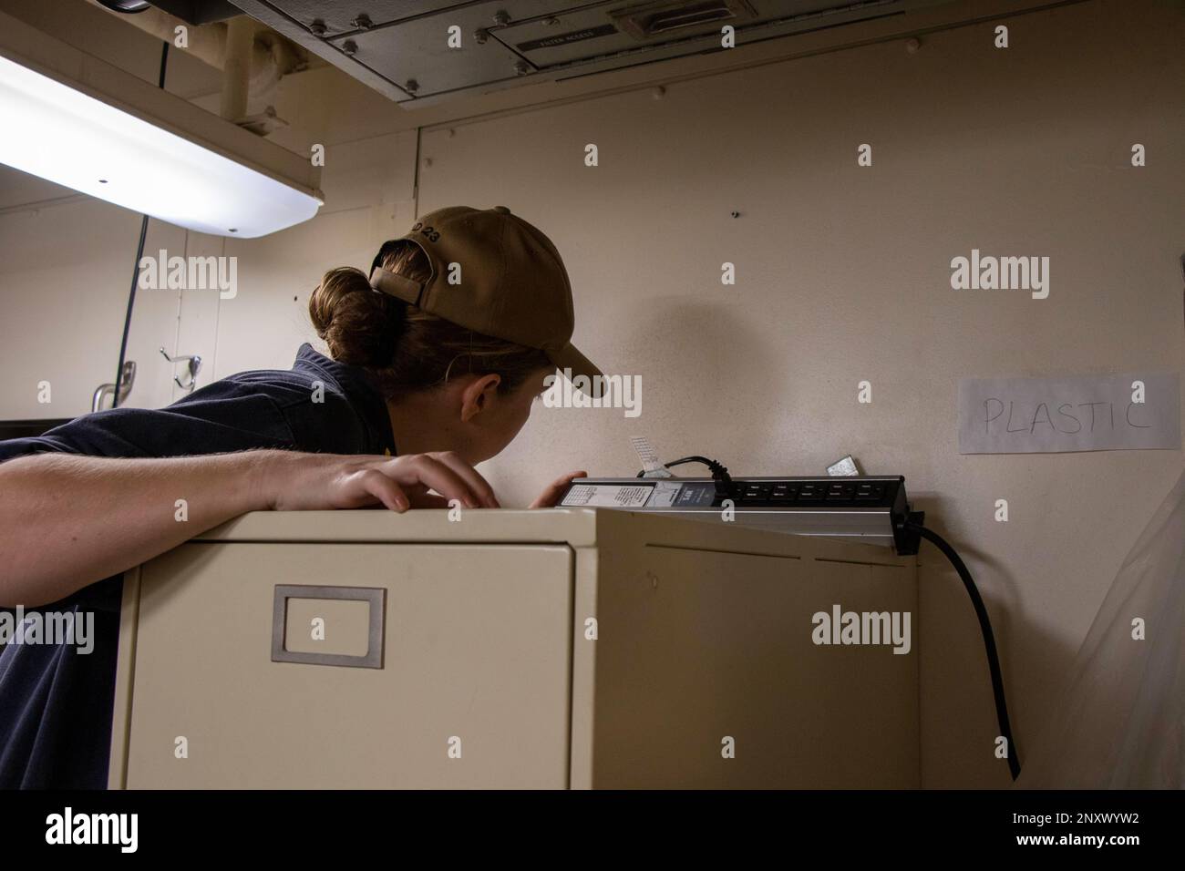 SINGAPORE (Feb. 22, 2023) – Ensign Heather Bahrman verifies office ...