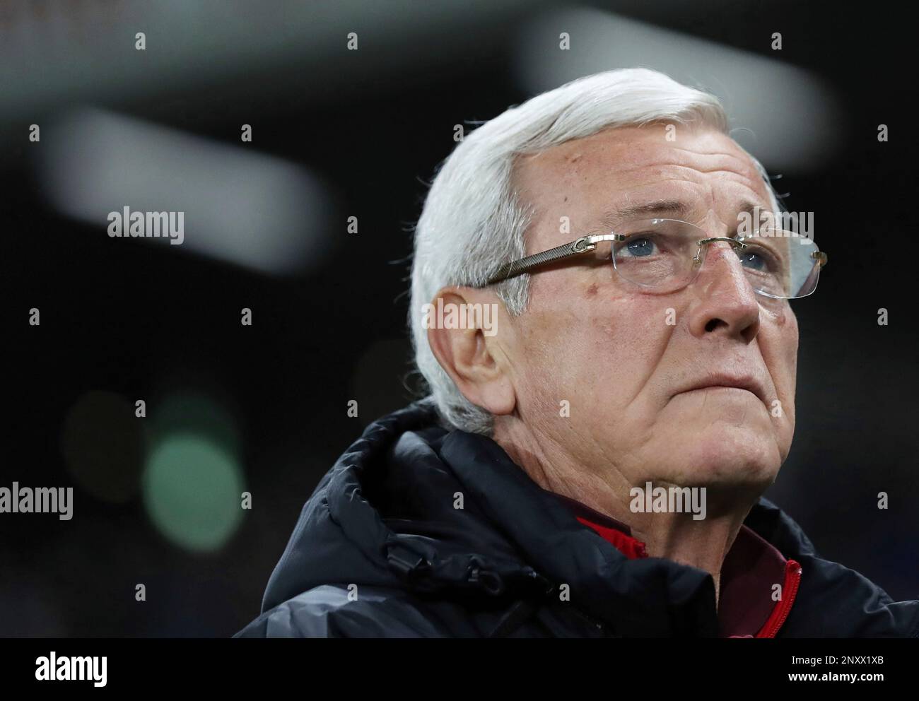 Marcello Lippi, Chinese national football team manager, gazes the EAFF ...