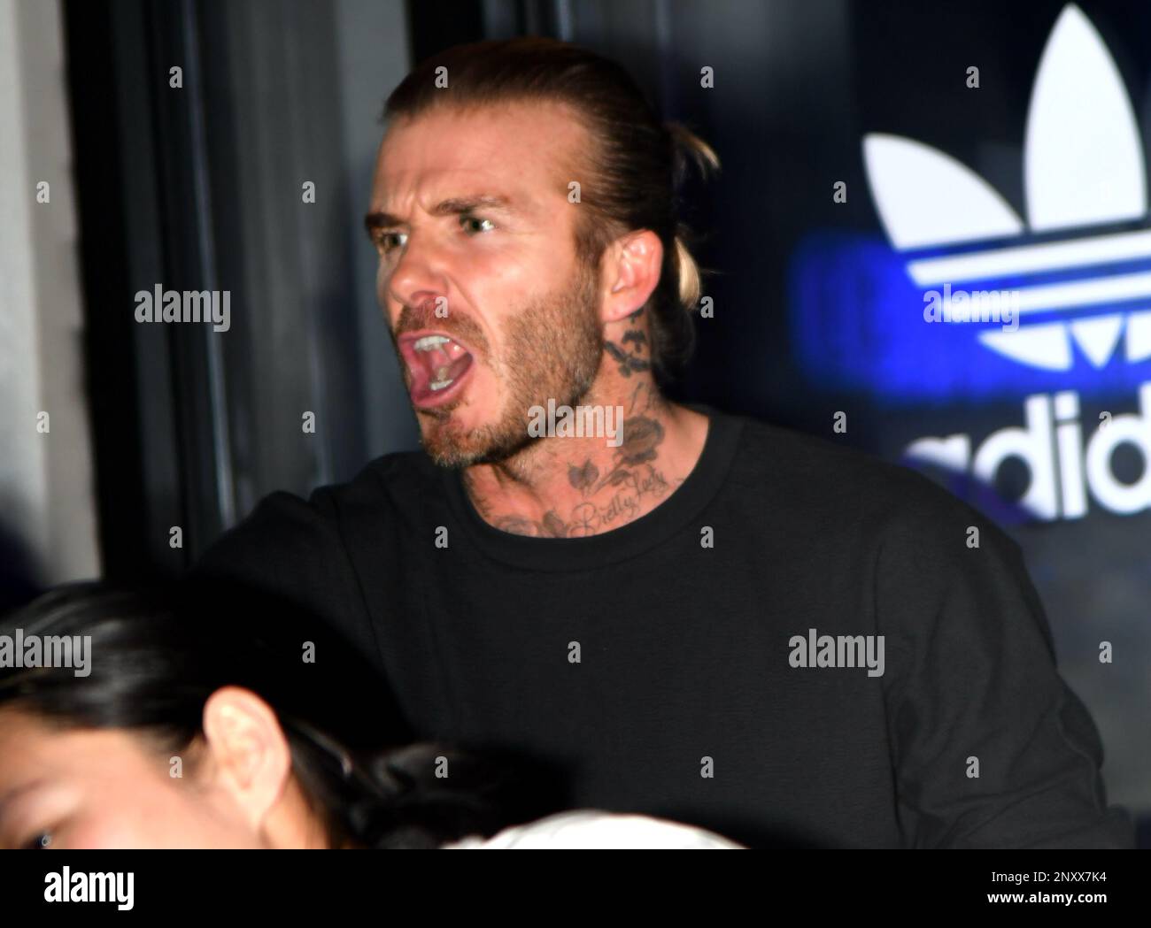 English soccer star David Beckham shouts in anger to fans as he was ...