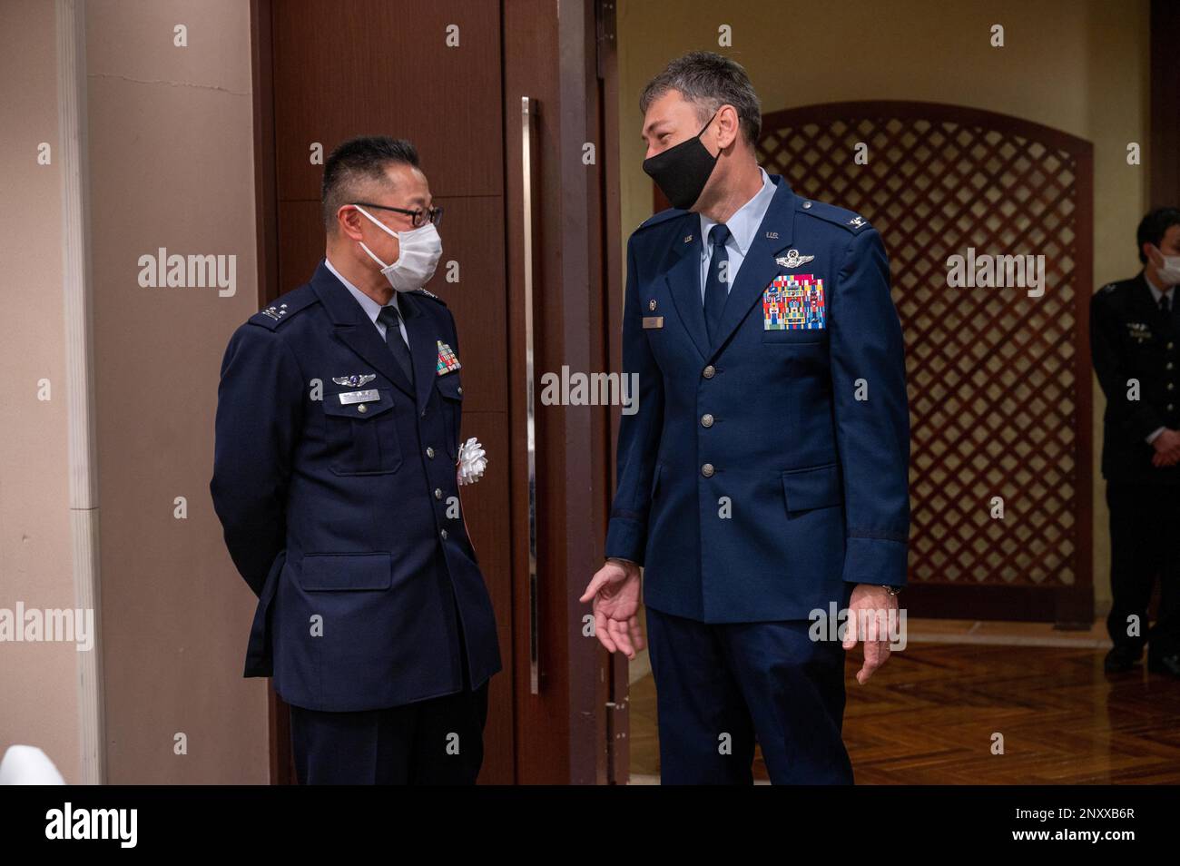 U.S. Air Force Col. Andrew Roddan, 374th Airlift Wing commander (right ...