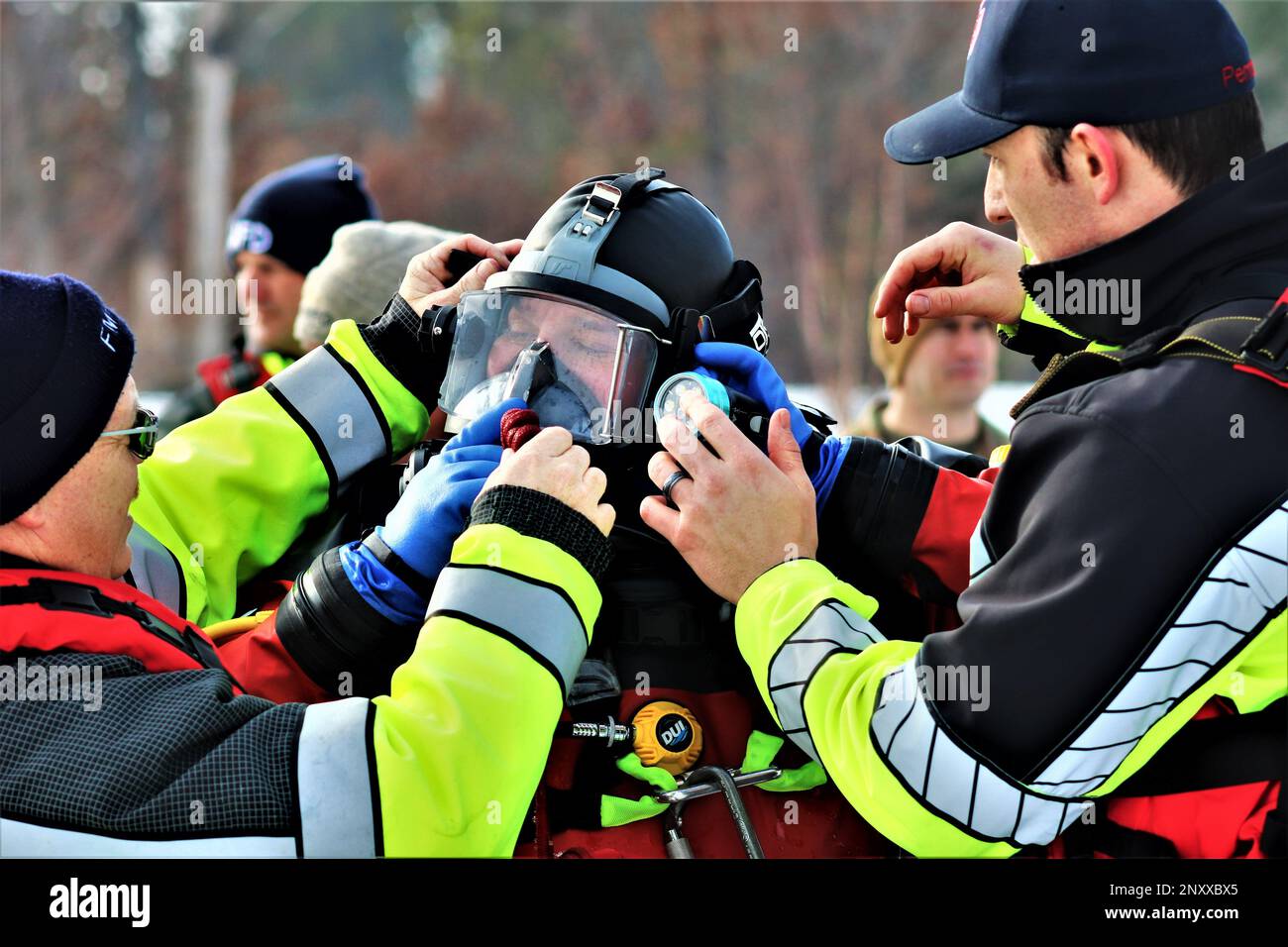 Firefighters with the Directorate of Emergency Services Fire Department ...