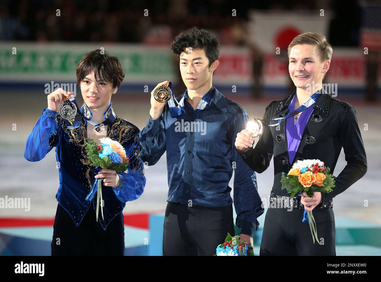 (L-R) Shoma Uno of Japan, silver, Nathan Chen of U.S.A., winner and Mikhail Kolyada of Russia ...