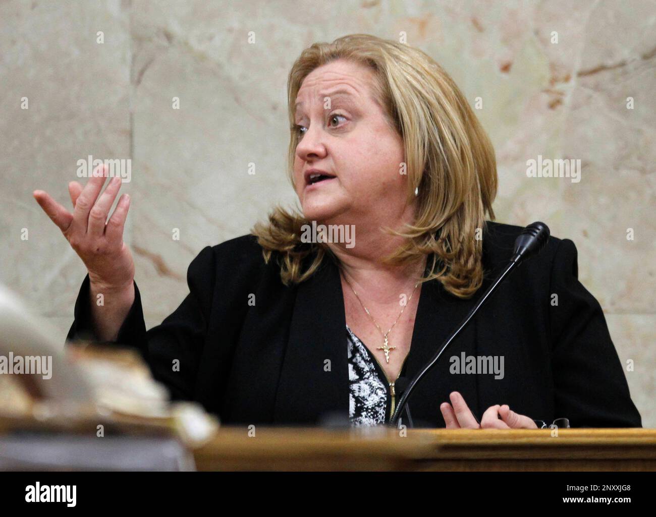 Dr. Norma Farley, a forensic pathologist, testifies during John Bernard ...
