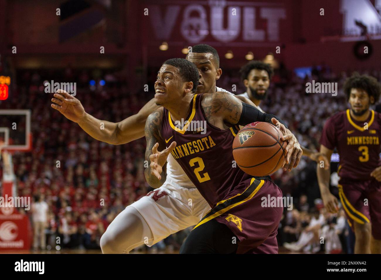 LINCOLN, NE - DECEMBER 05: Minnesota forward Nate Mason (2) dribbles to ...