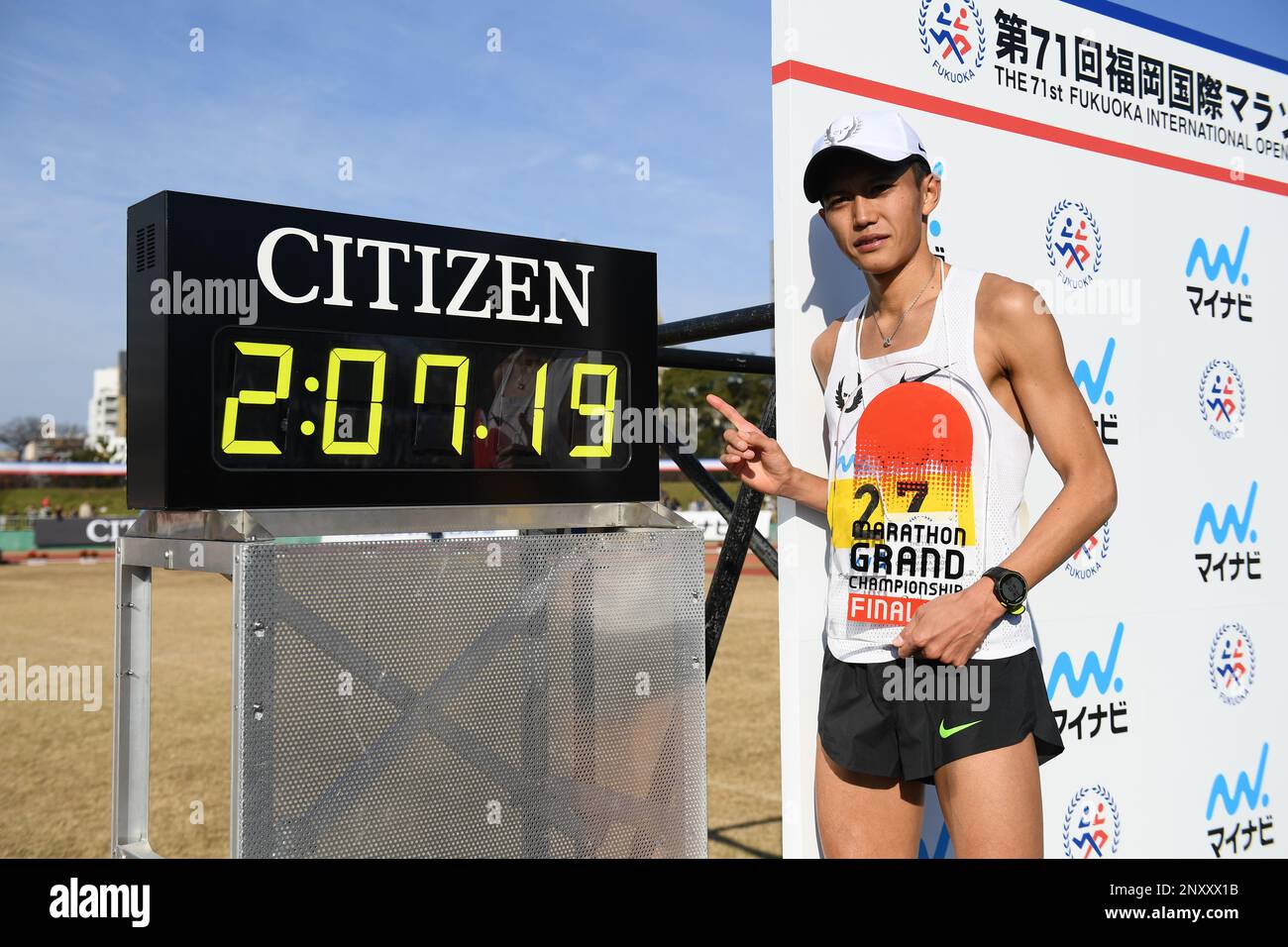 Suguru Osako (JPN) poses after placing third in 2:07:19 during the 2017 ...