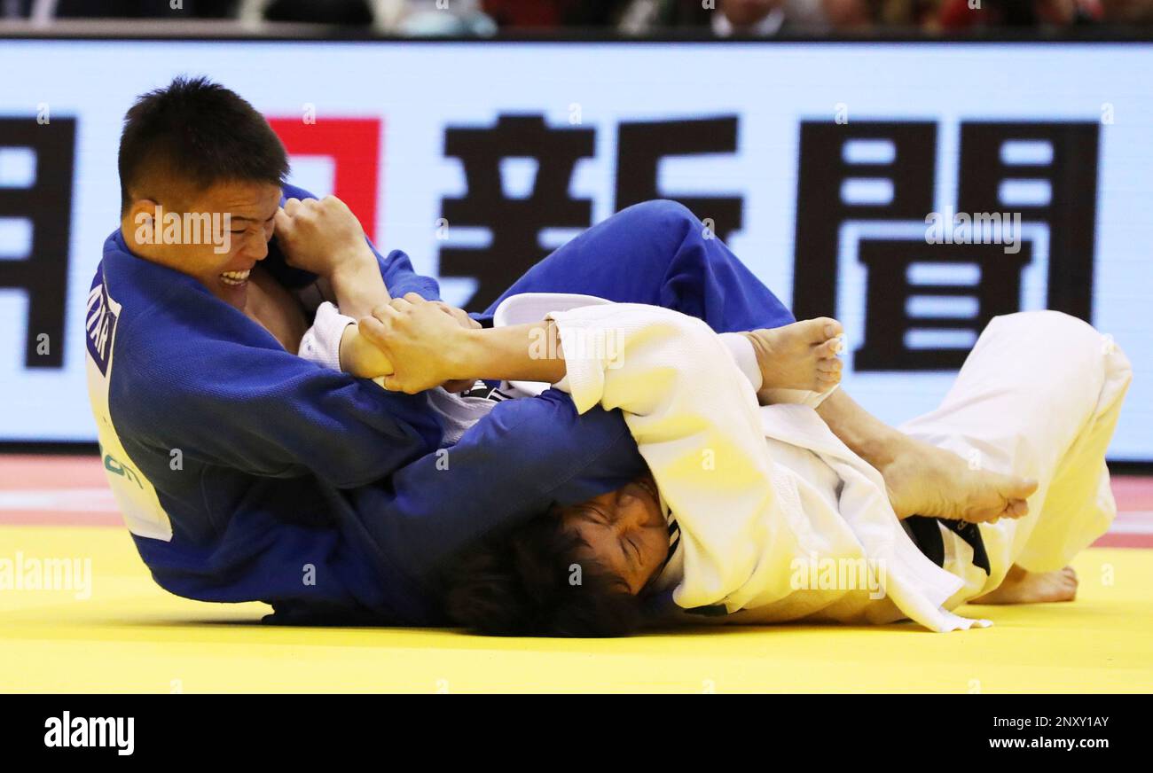 Mongolian Uuganbaatar Togonbaatar(L) attacks South Korean Sungho Lee during men's 81kg final at ...