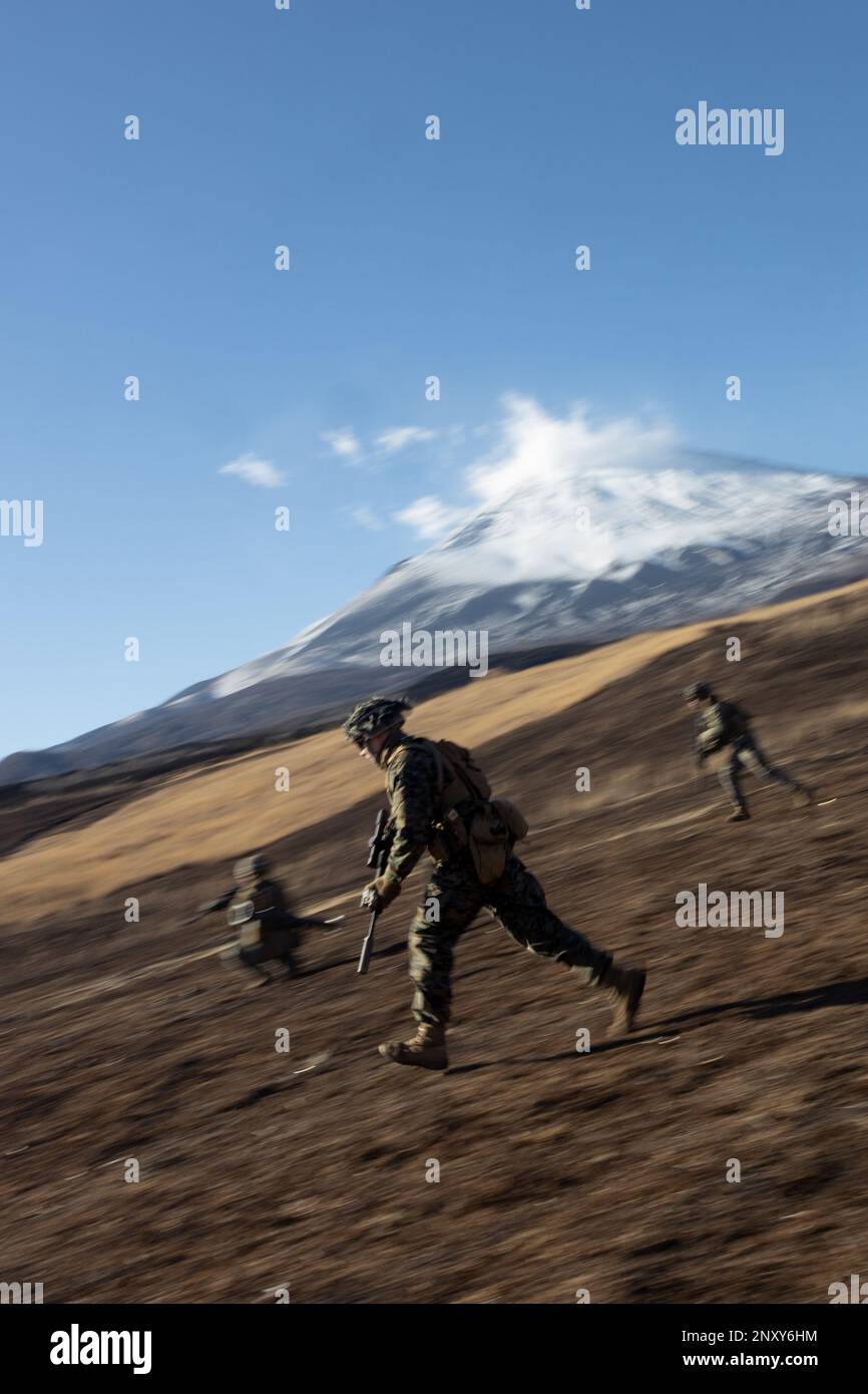 U.S. Marines with 3d Battalion, 4th Marines maneuver through a rocket ...