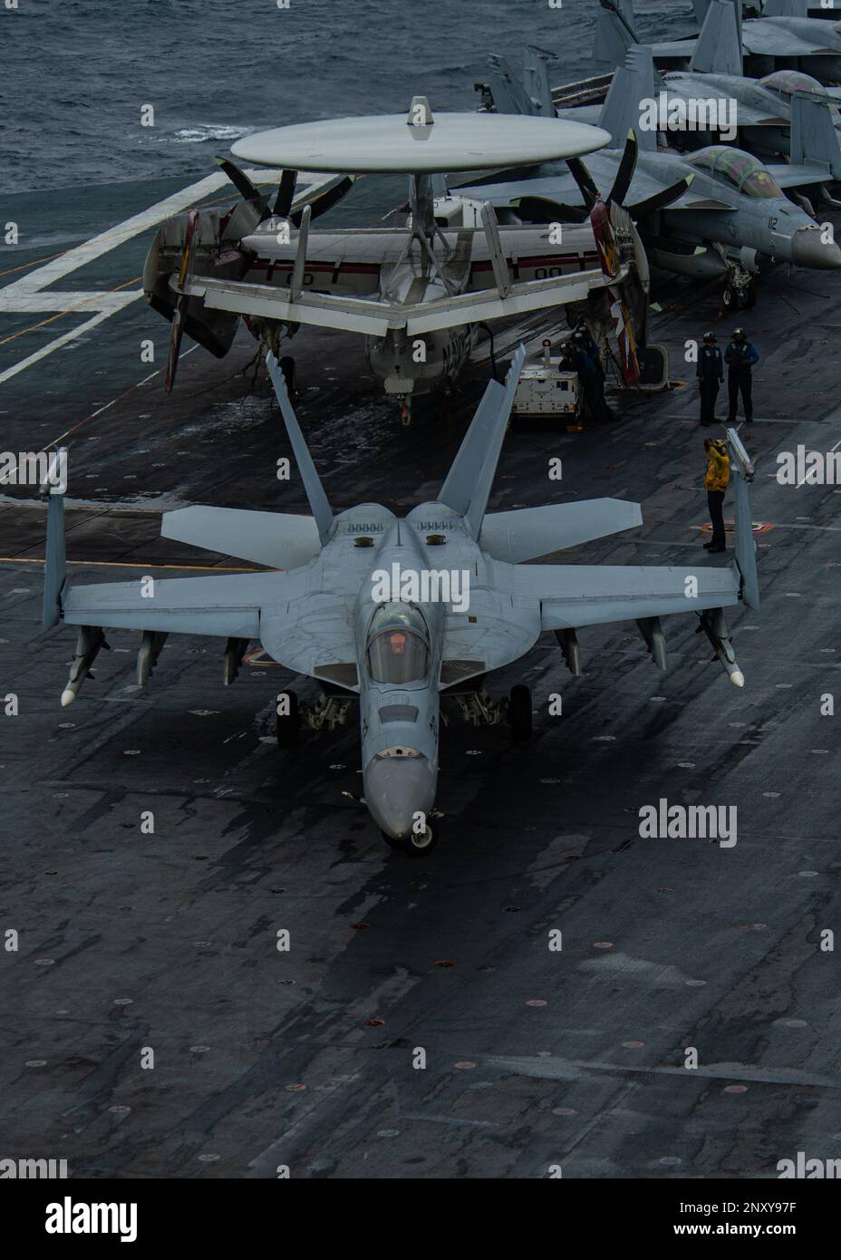 230130-N-MH015-1050 SOUTH CHINA SEA (Jan. 30, 2023) An F/A-18E Super Hornet from the “Kestrels ...