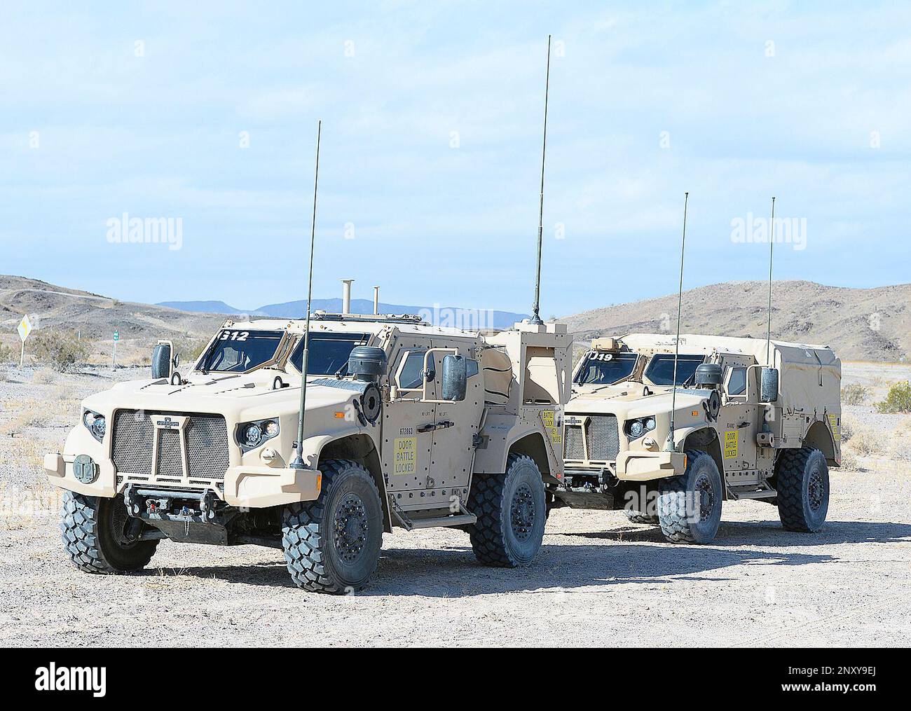 The Joint Light Tactical Vehicle (JLTV) comes in four-door (left) and ...