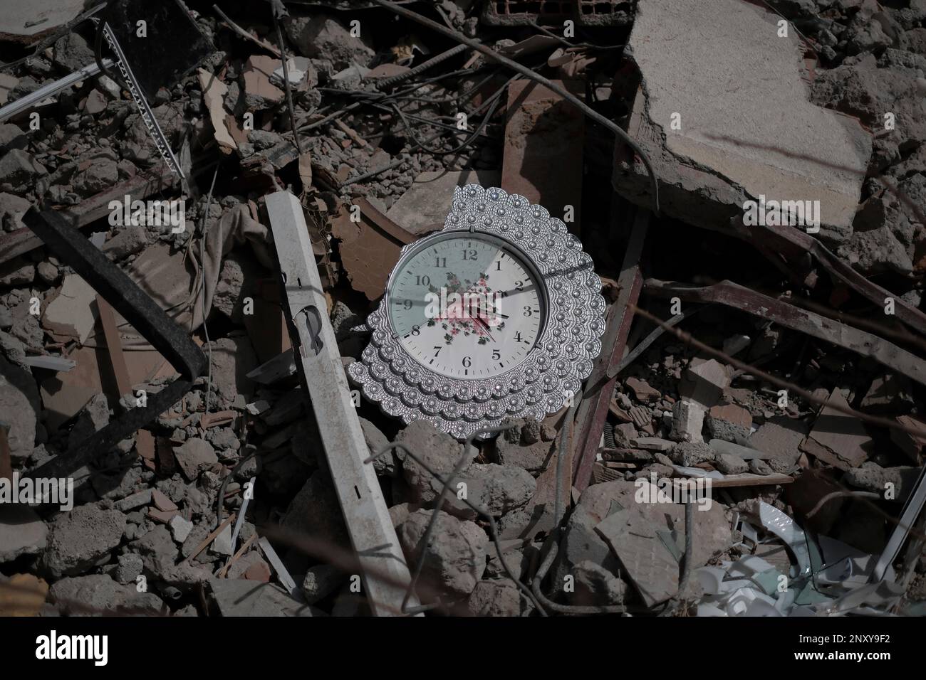 A clock that has stopped at the time of the earthquake is seen in ...