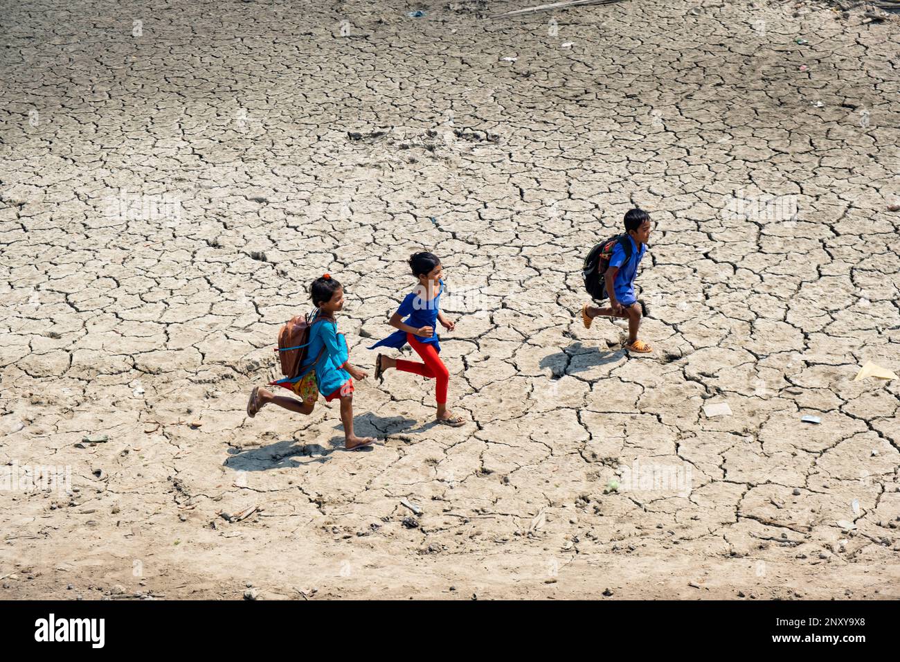 Nolian, Khulna, Bangladesh. 1st Mar, 2023. School children run home ...