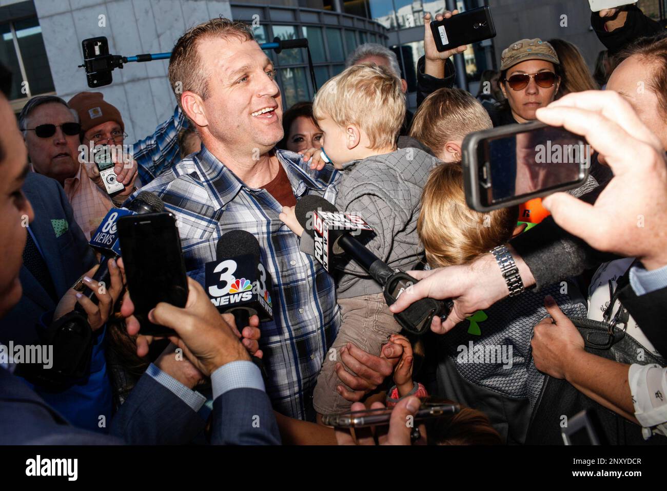 Ammon Bundy embraces his children outside the Lloyd George U.S ...