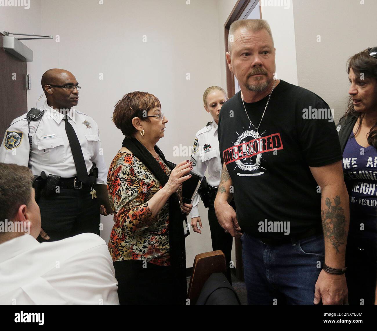 Kenny Hoffa, right, enters the courtroom to watch Howell Emanuel ...