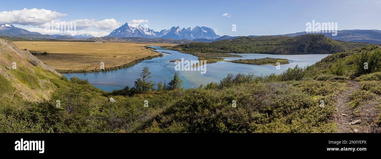 Serrano River, golden pampas and snowy mountains of Torres del Paine ...