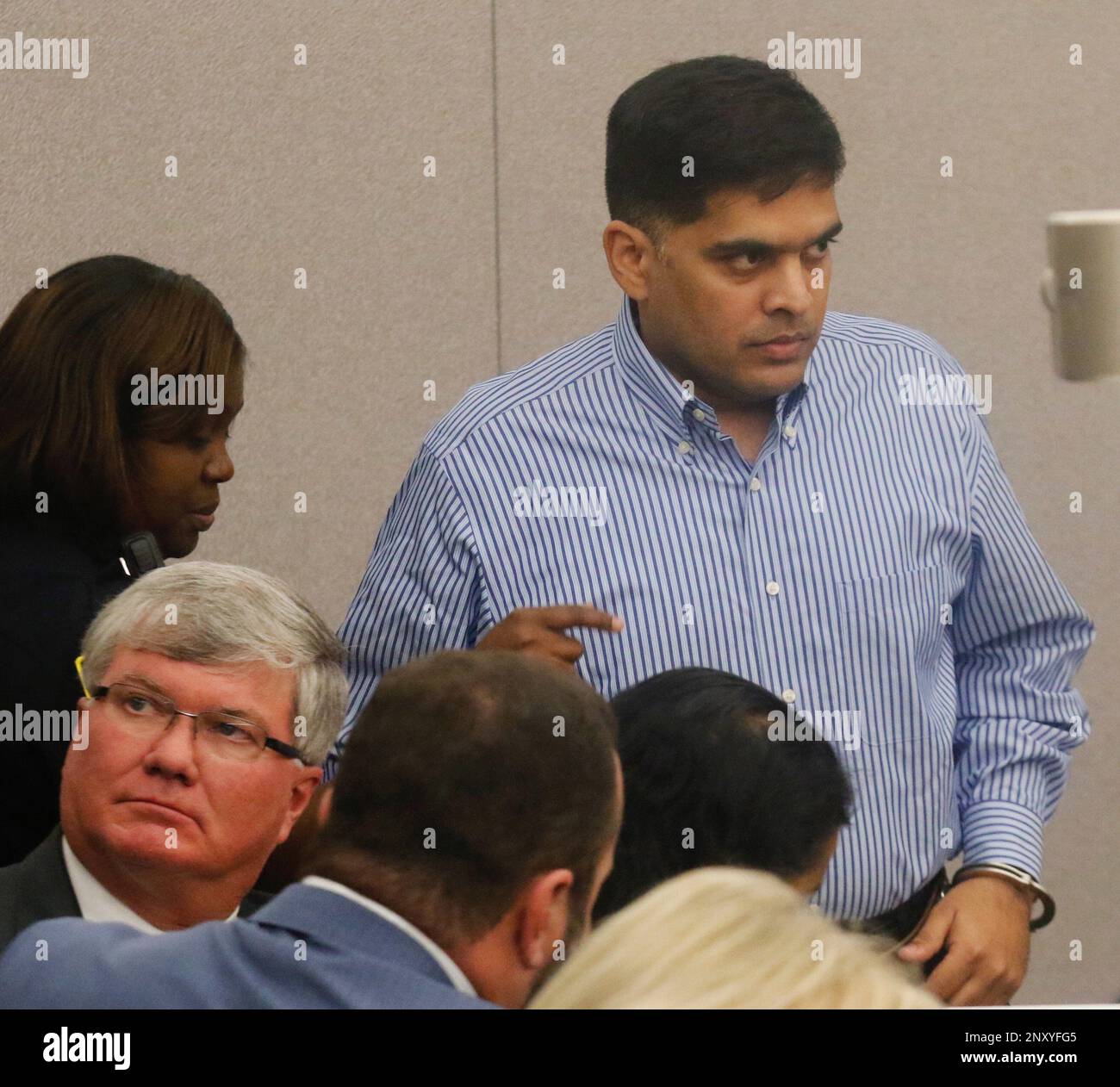 Wesley Mathews, father of Sherin Mathews, walks to the witness stand in ...