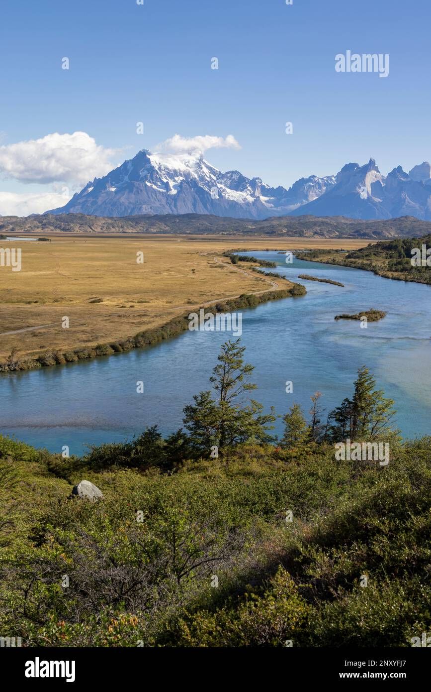 Serrano River, golden pampas and snowy mountains of Torres del Paine ...