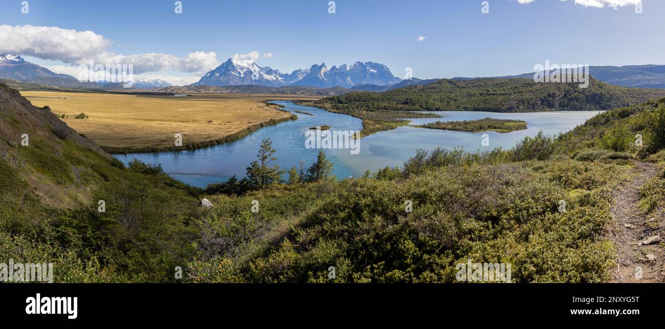 Serrano River, golden pampas and snowy mountains of Torres del Paine ...