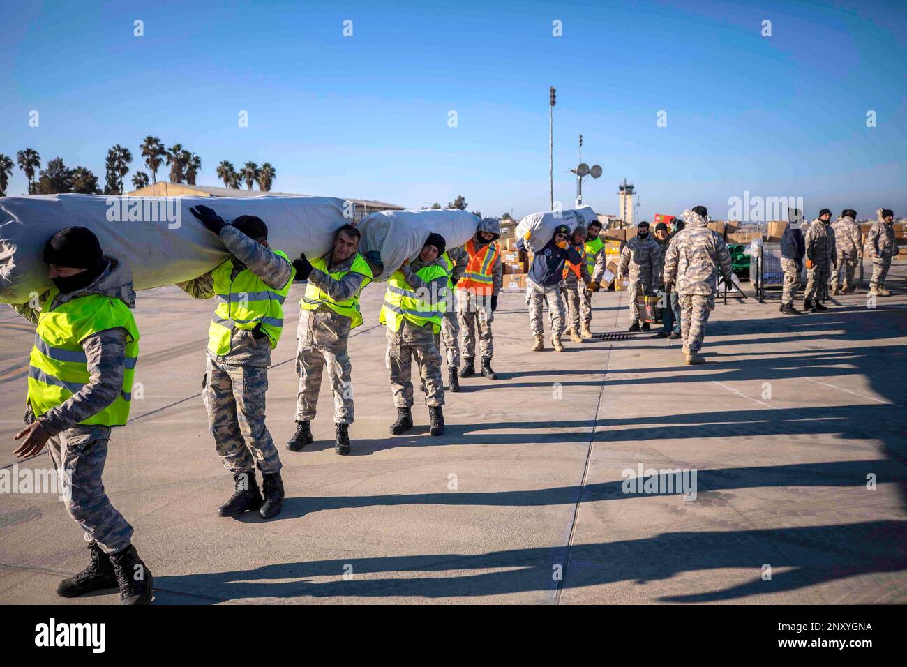 Turkish military personnel prepare to load a U.S. Army CH-47 Chinook ...