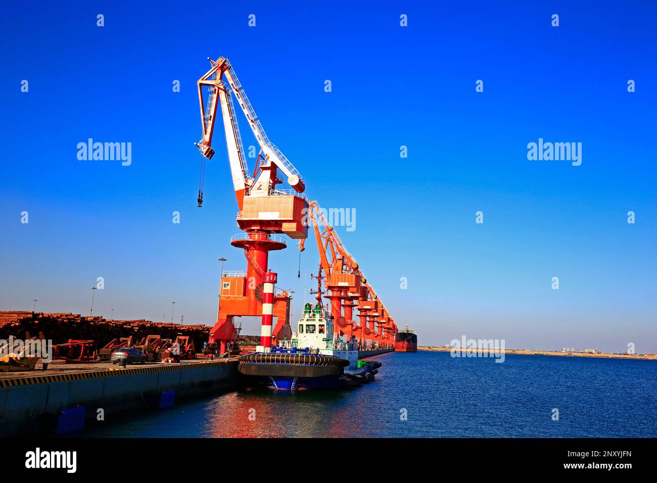 Port crane work Stock Photo - Alamy