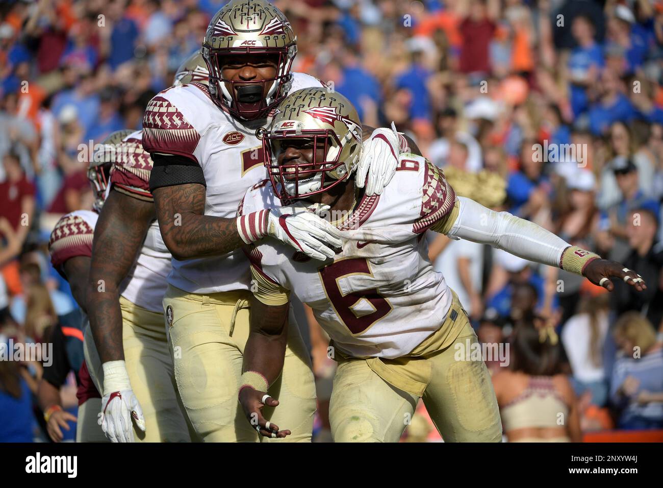 Florida State linebacker Matthew Thomas (6) is congratulated by ...