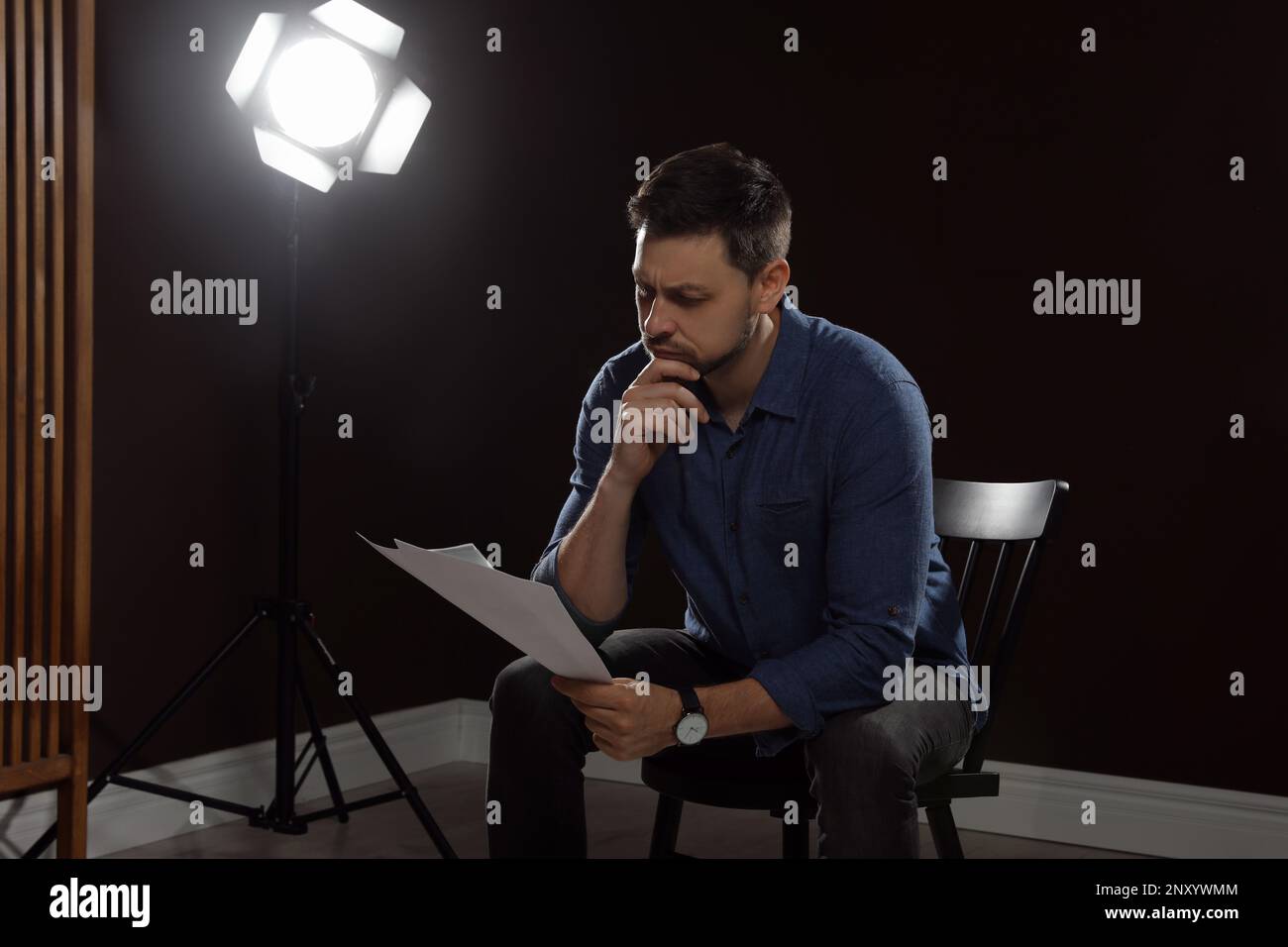 Professional actor reading his script during rehearsal in theatre Stock ...