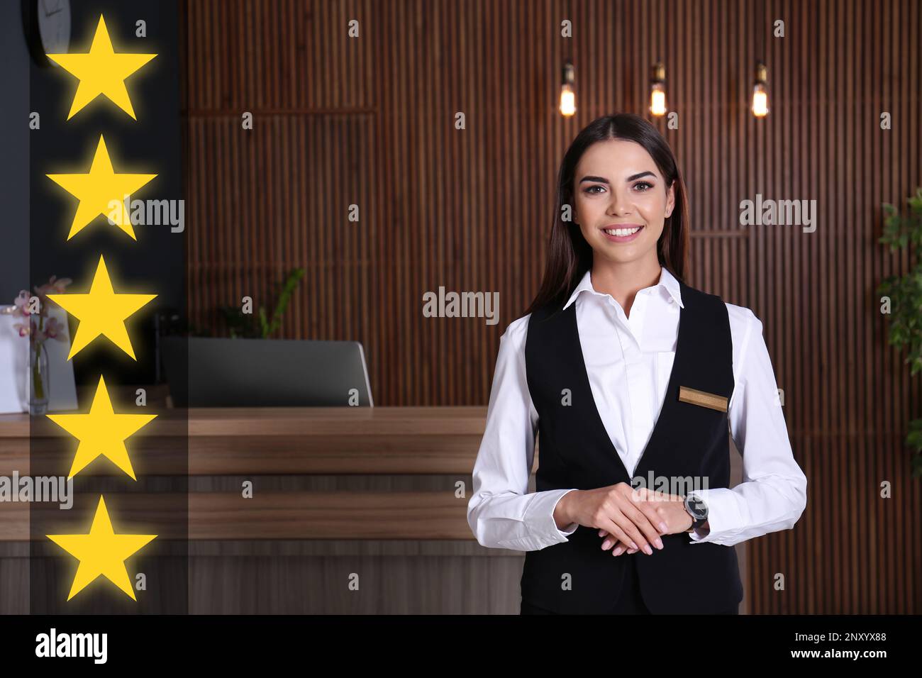 Five Star Luxury Hotel. Portrait of receptionist in lobby Stock Photo ...