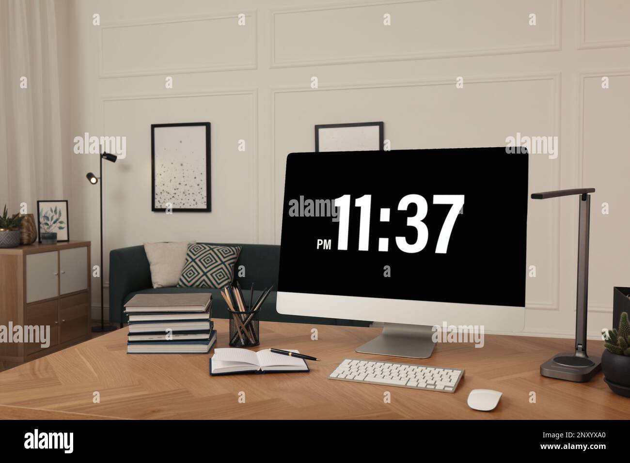 Comfortable workplace with modern computer on wooden desk in room ...