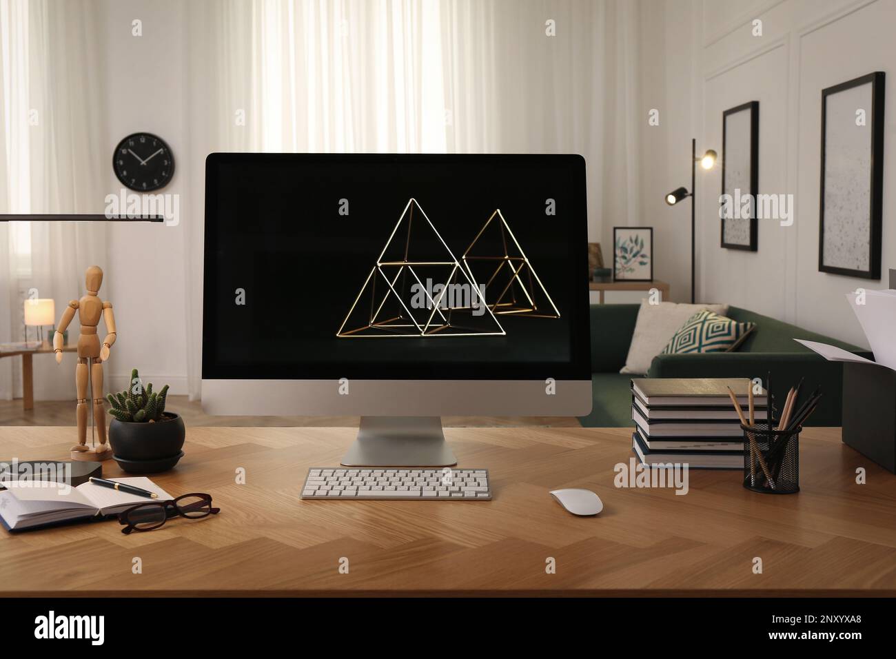 Workplace with computer on wooden desk in light room. Modern interior ...