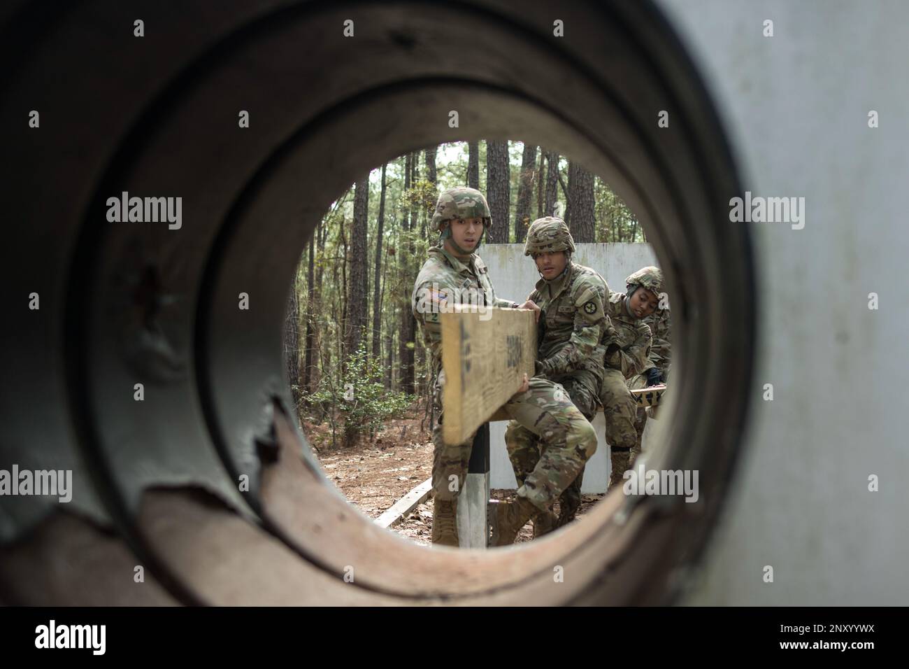 Spc. Stephon Mixter (left), Pfc. Robert Broughton (middle) and Pfc ...