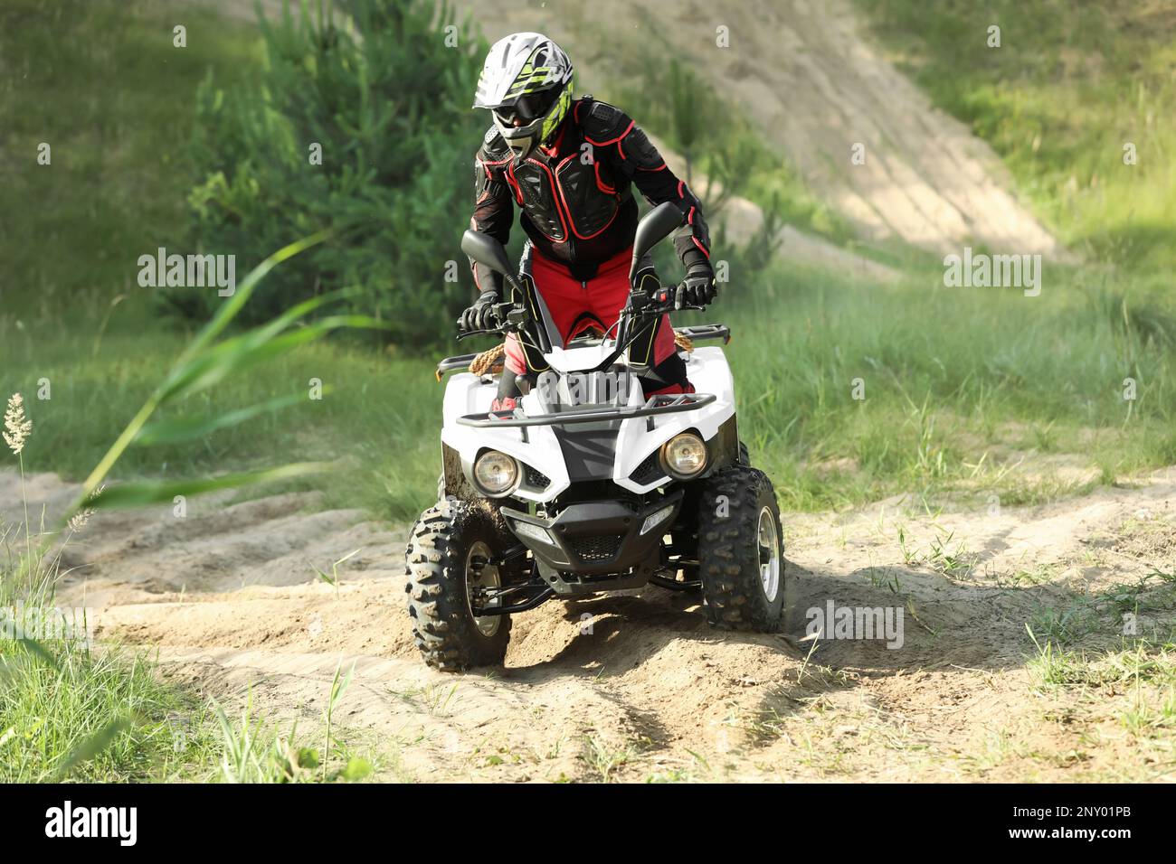 Man on quad with helmet hi-res stock photography and images - Alamy