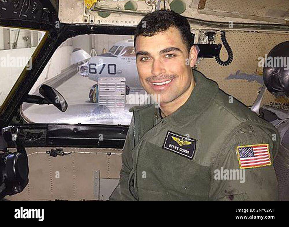 In this photo provided by the U.S. Navy, Lt. Steven Combs, assigned to ...